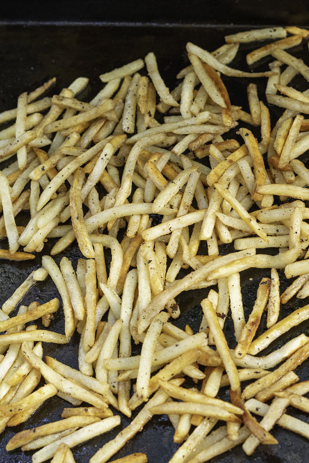 Crispy Frozen French Fries on the Blackstone Griddle - Smoked BBQ Source