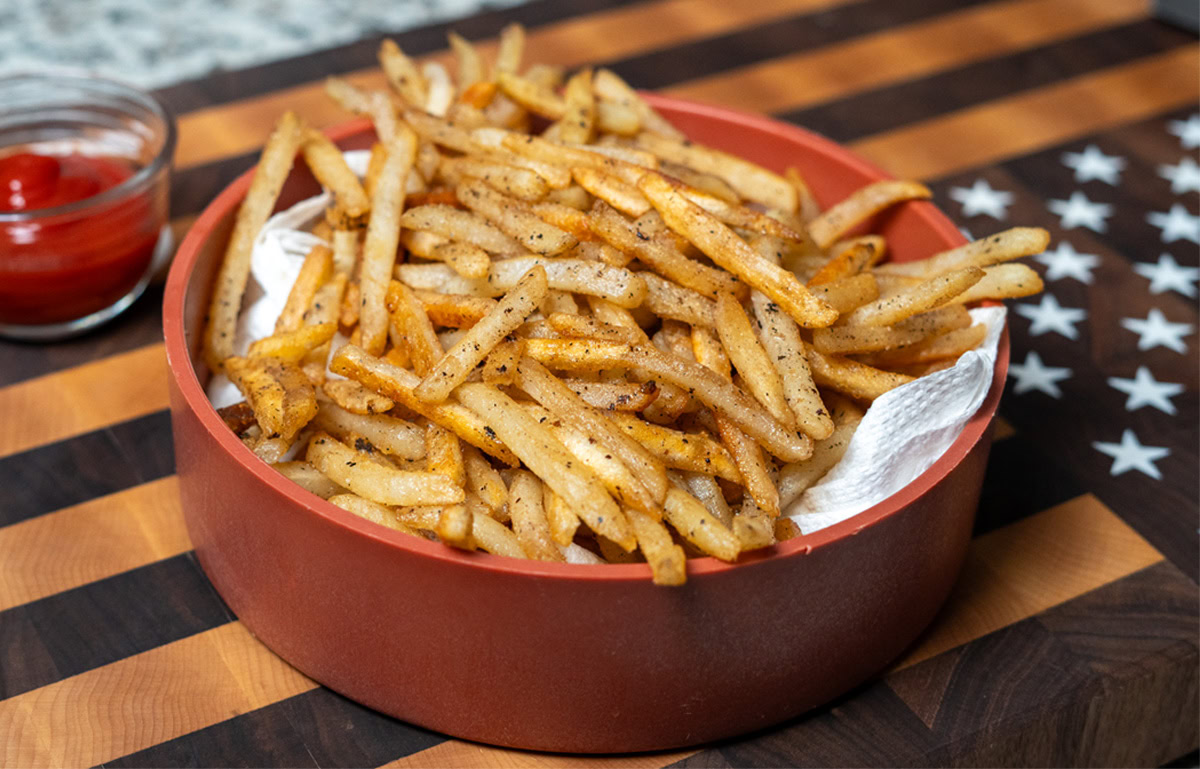 Crispy Frozen French Fries on the Blackstone Griddle - Smoked BBQ Source